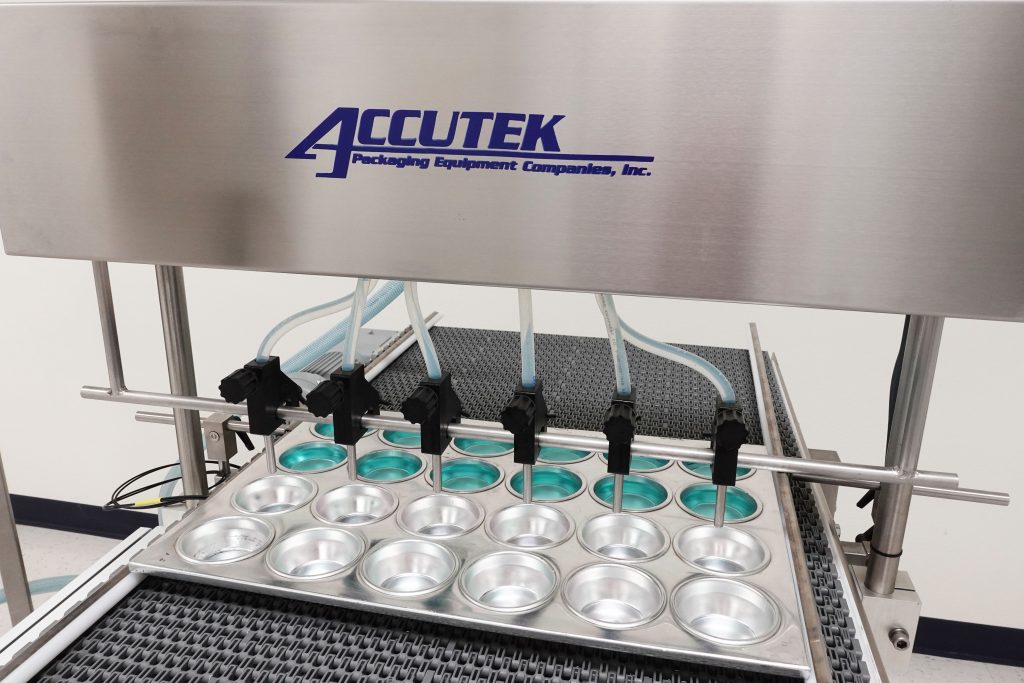 Servo Bakery Tray Depositor - Accutek Packaging Equipment